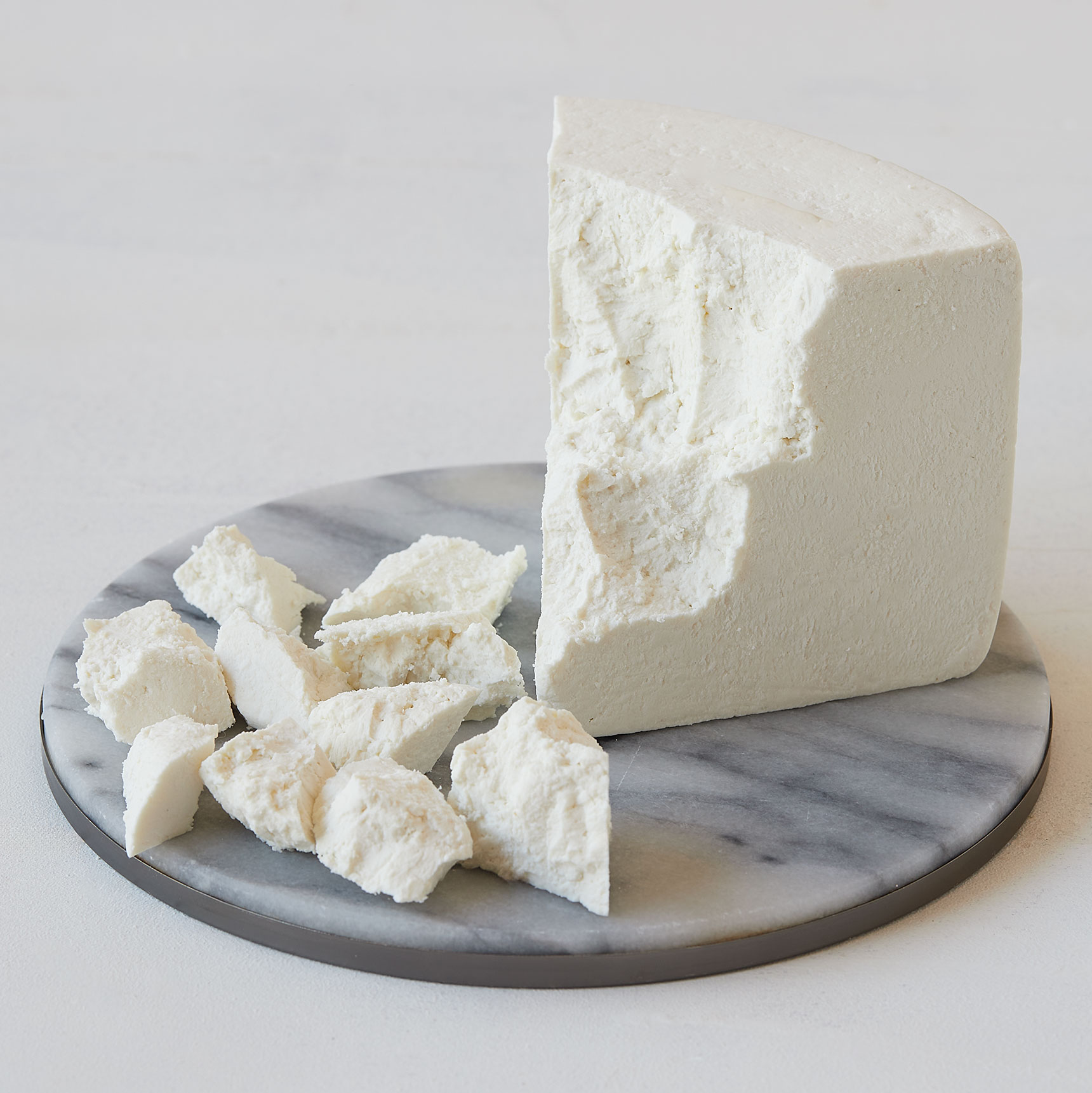 Ricotta Salata - a salty, crumbly aged ricotta cheese | Murray's Cheese