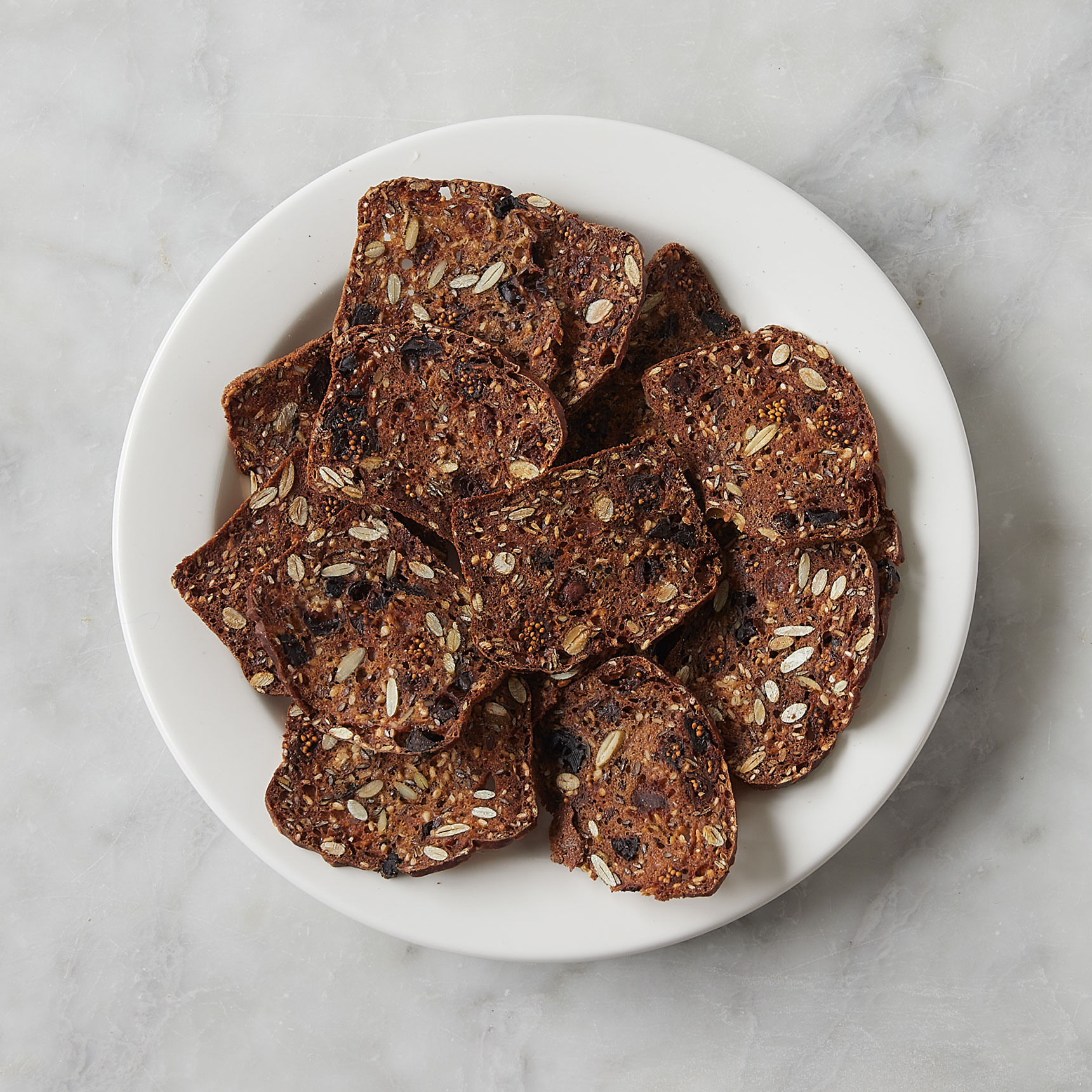 Raincoast Fig and Olive Crisps - a hearty seeded cracker with figs and olives | Murray's Cheese