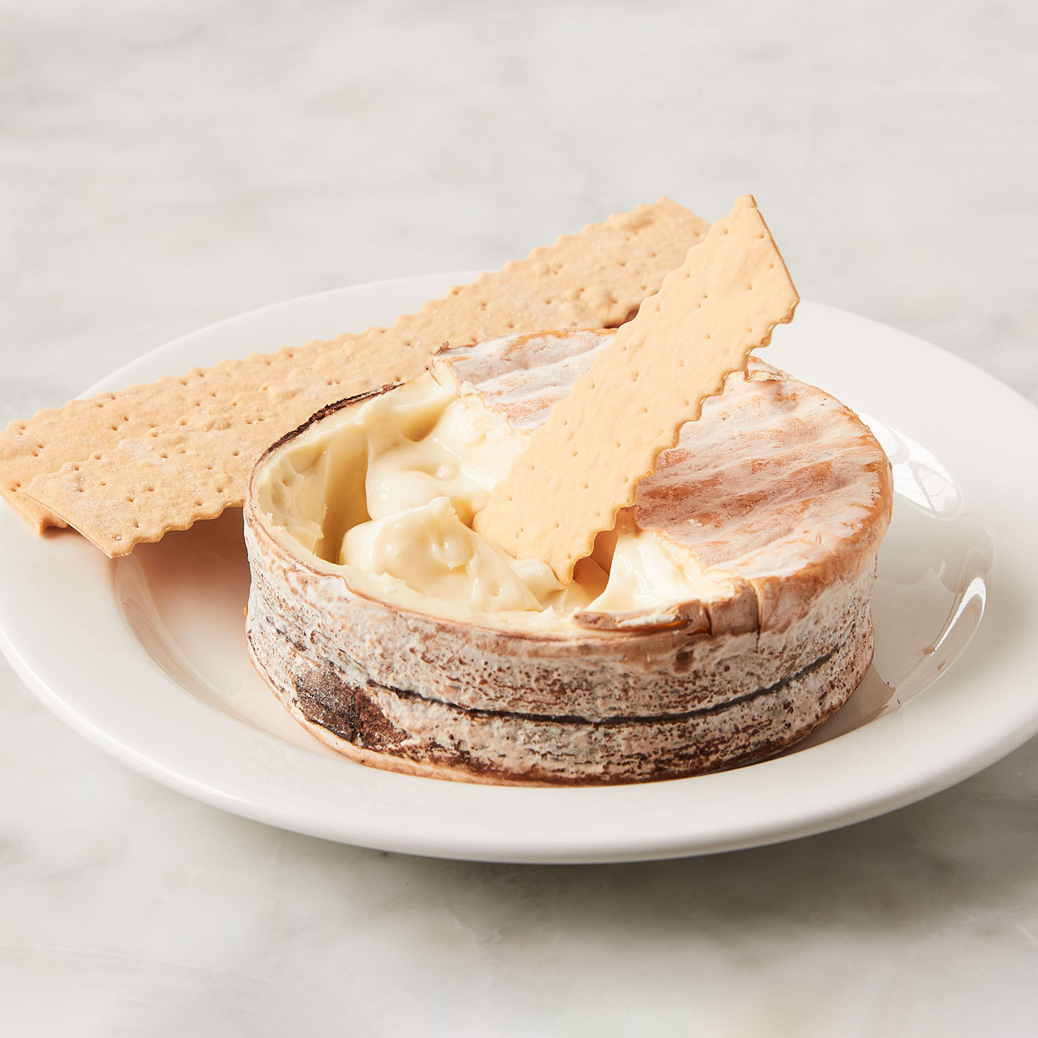 Jasper Hill Winnimere – soft, velvety, woodsy | Murray's Cheese