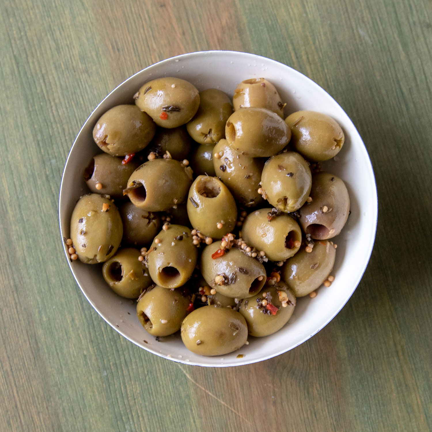 Sicilian Herb Marinated Olives, Pitted - a package of pitted olives in ...