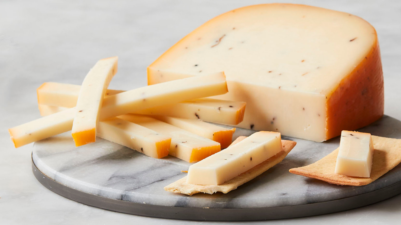 Langres – a rich, creamy, orange cow’s milk cheese | Murray's Cheese